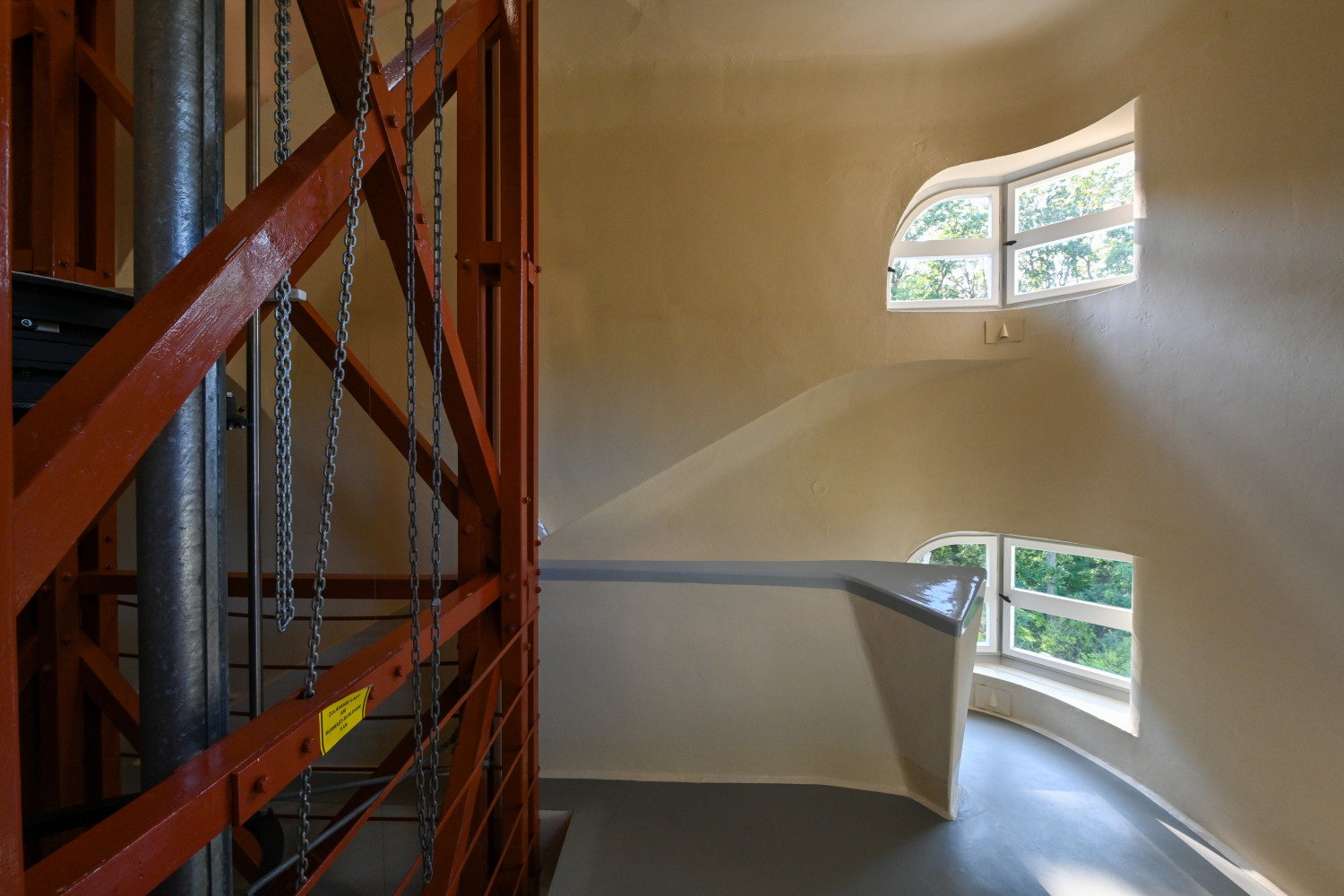 The staircase surrounding the inner tower widens naturally to the lens ...